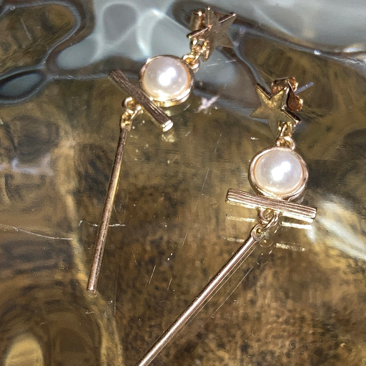 star x pearl piercings gold – 雑居ビル